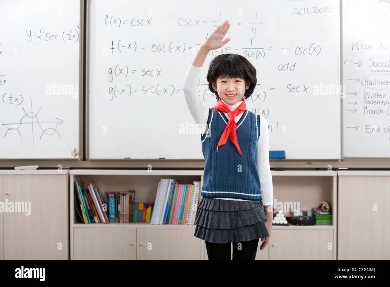 Young female student saluting Stock Photo - Alamy