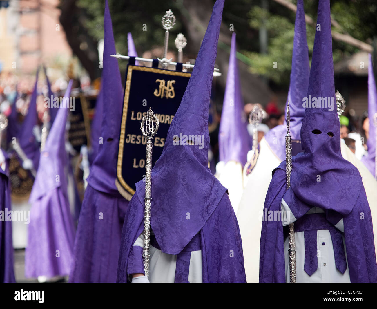 Nazarenos parading during Semana Santa in Malaga, Spain, April 2011 ...