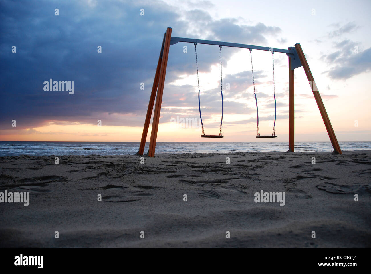 Swing on beach Stock Photo - Alamy