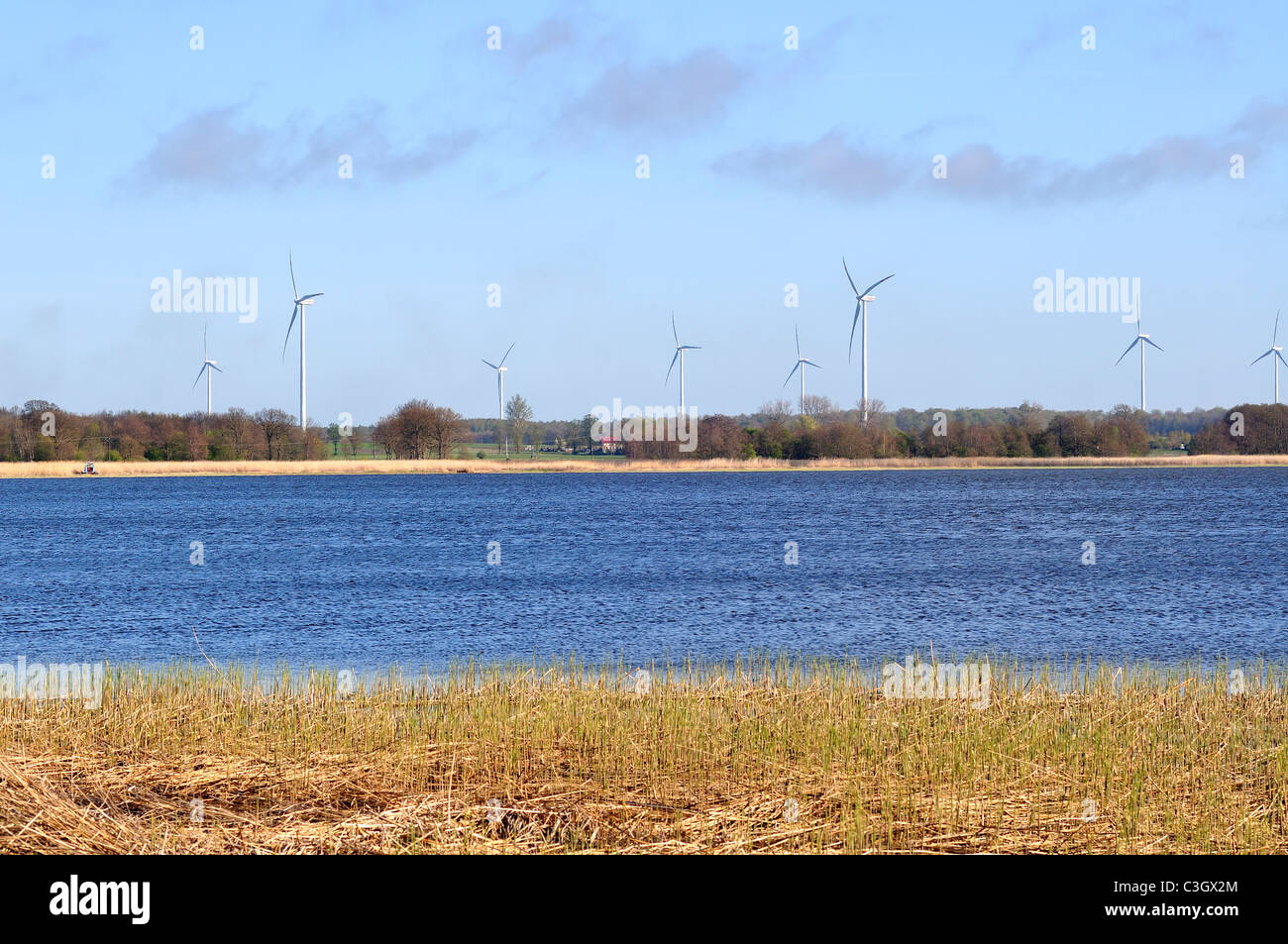 Wind turbines on the lake Stock Photo - Alamy