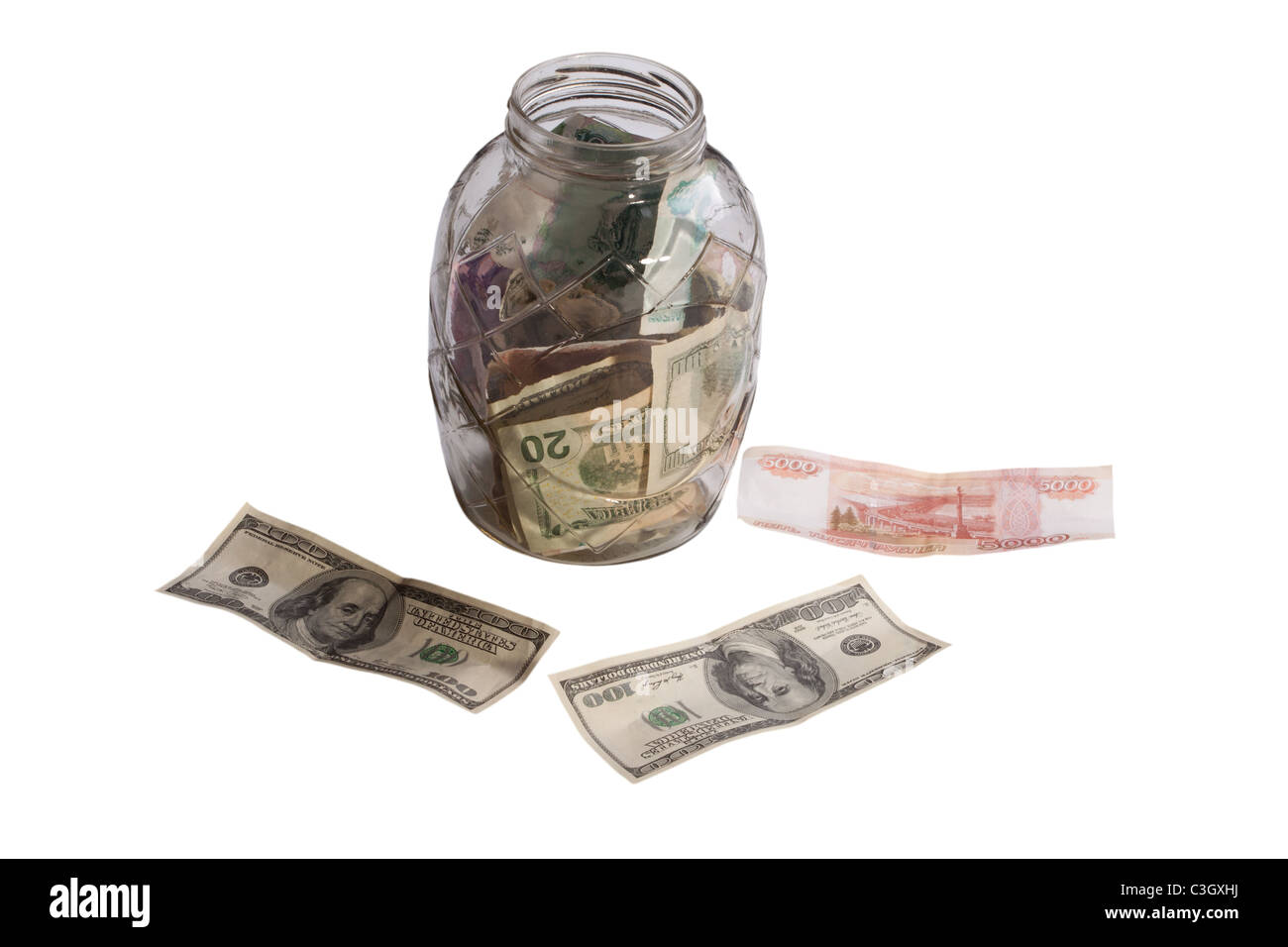 Bottle with various banknotes isolated on a white background Stock ...