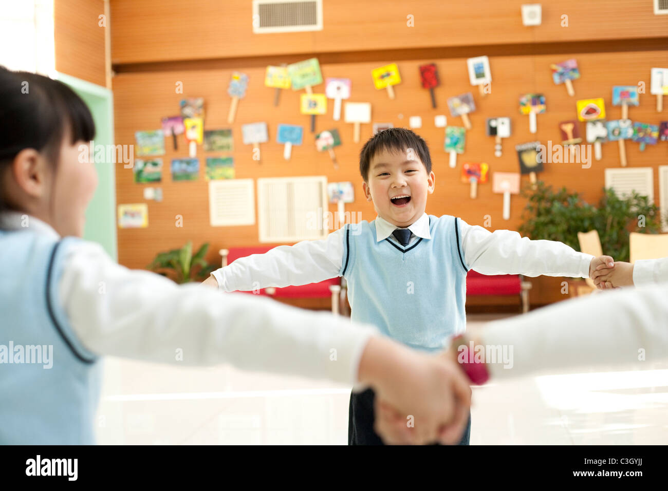 Students playing in the classroom Stock Photo - Alamy