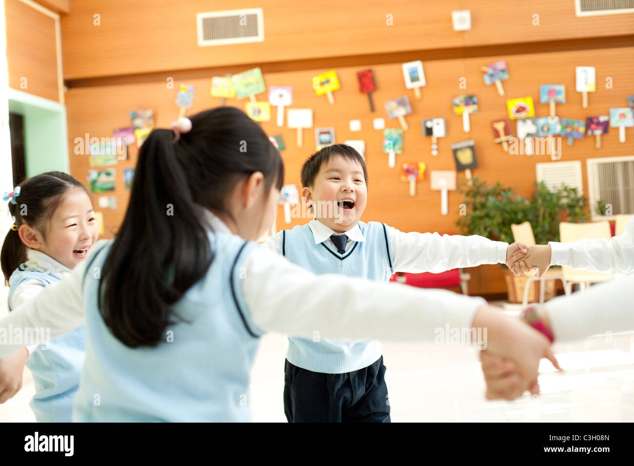 Students playing in the classroom Stock Photo - Alamy