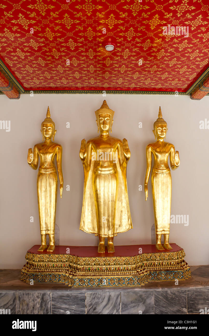 Three standing buddhas golden temple hi-res stock photography and ...