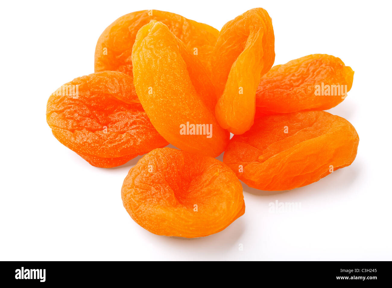 Dried apricots isolated on a white background Stock Photo - Alamy