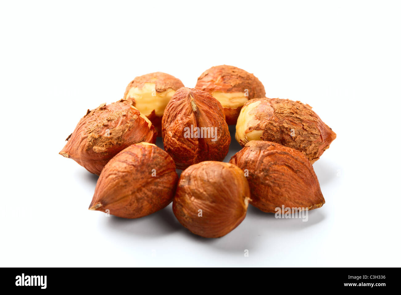 Wood nuts isolated on a white background Stock Photo - Alamy