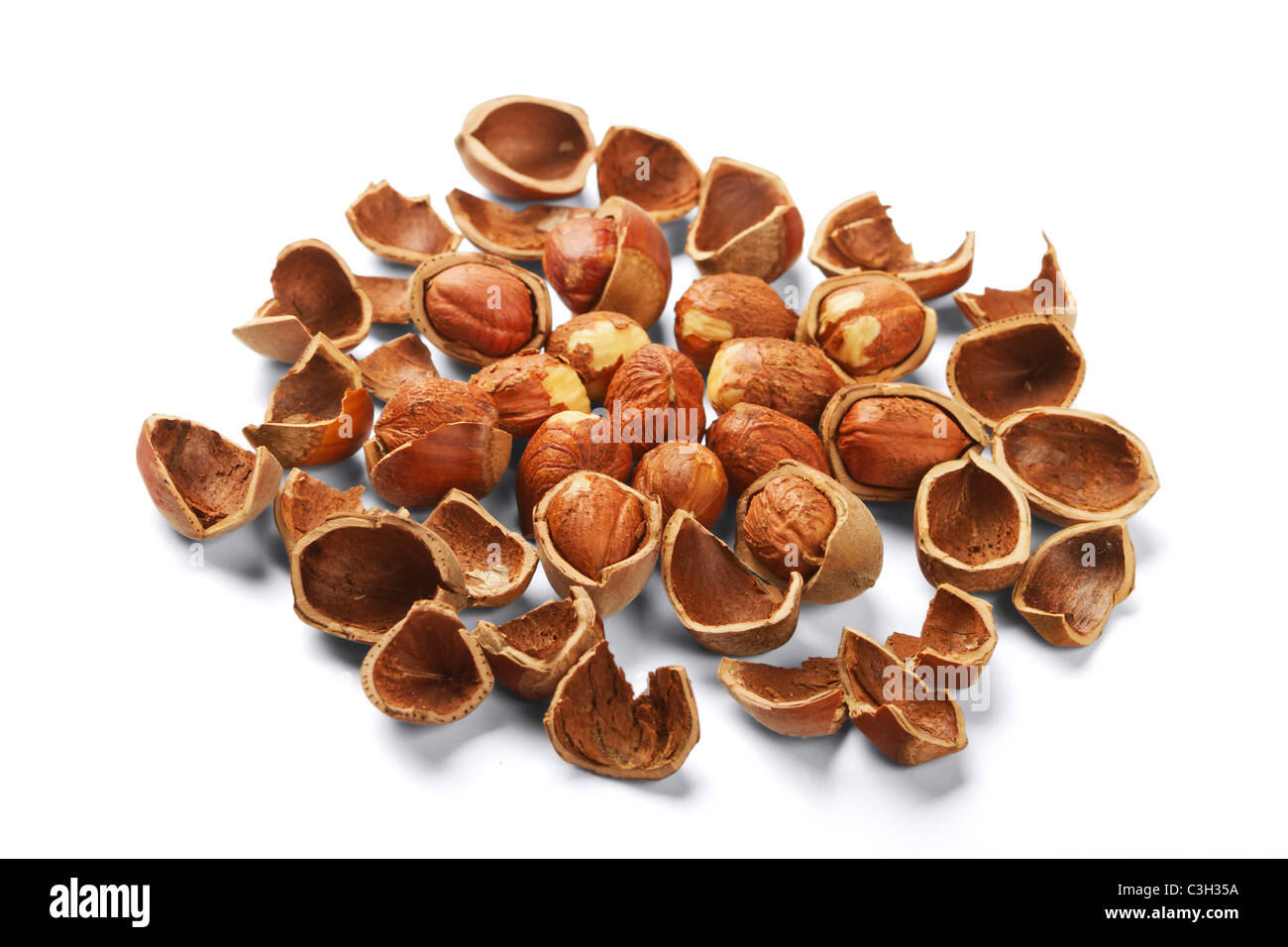 shell of nuts and nuts isolated on a white background Stock Photo - Alamy