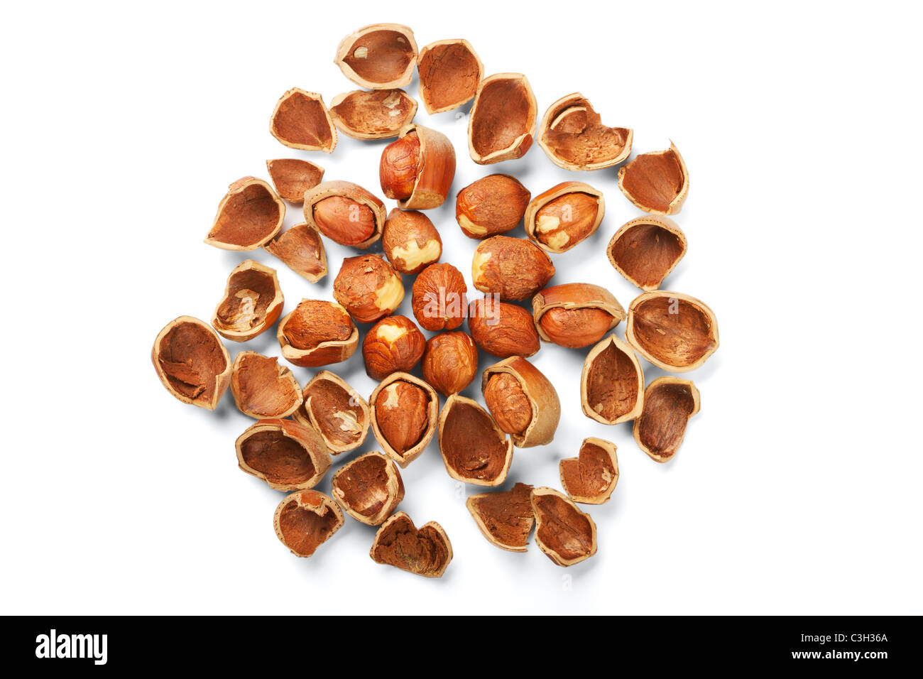 shell of nuts and nuts isolated on a white background Stock Photo - Alamy