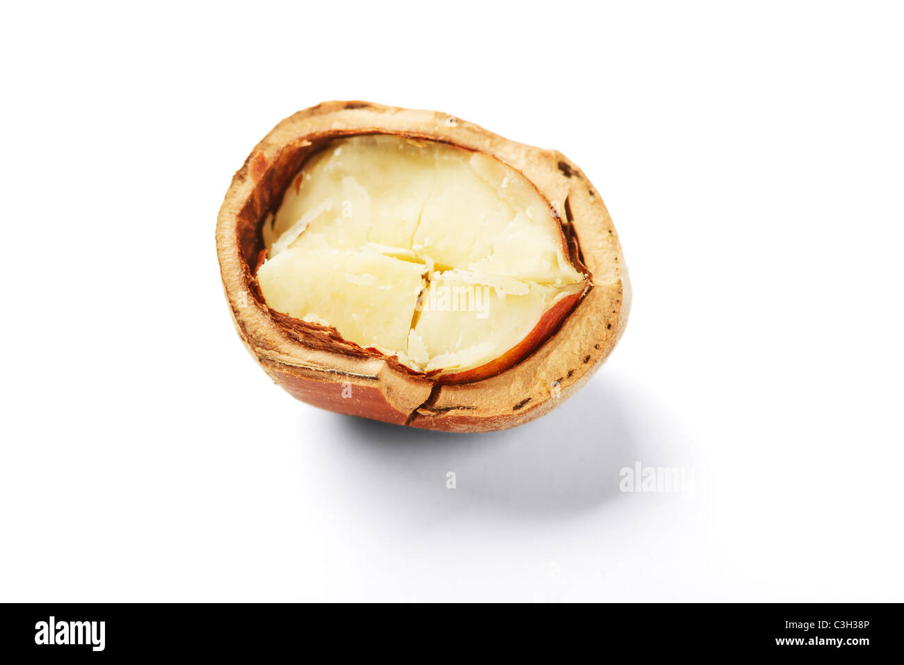 damaged nut isolated on a white background Stock Photo - Alamy