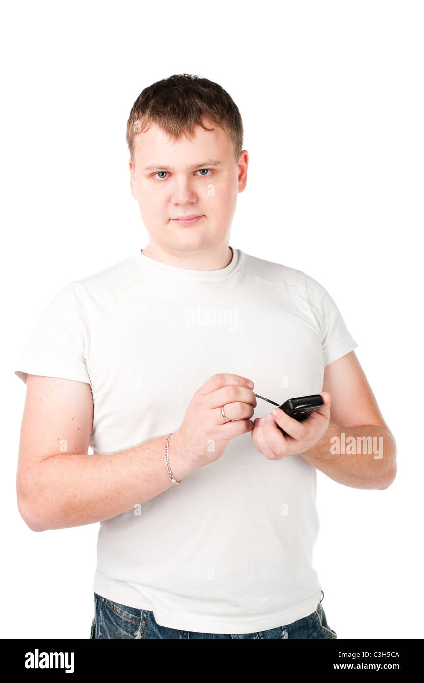 young casual man with phone, isolated on white background Stock Photo ...