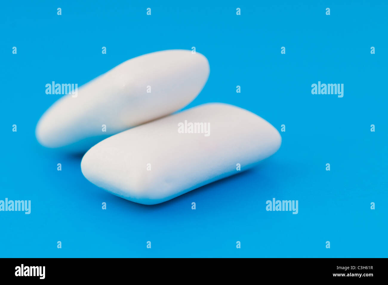 Chewing gums on blue Stock Photo - Alamy