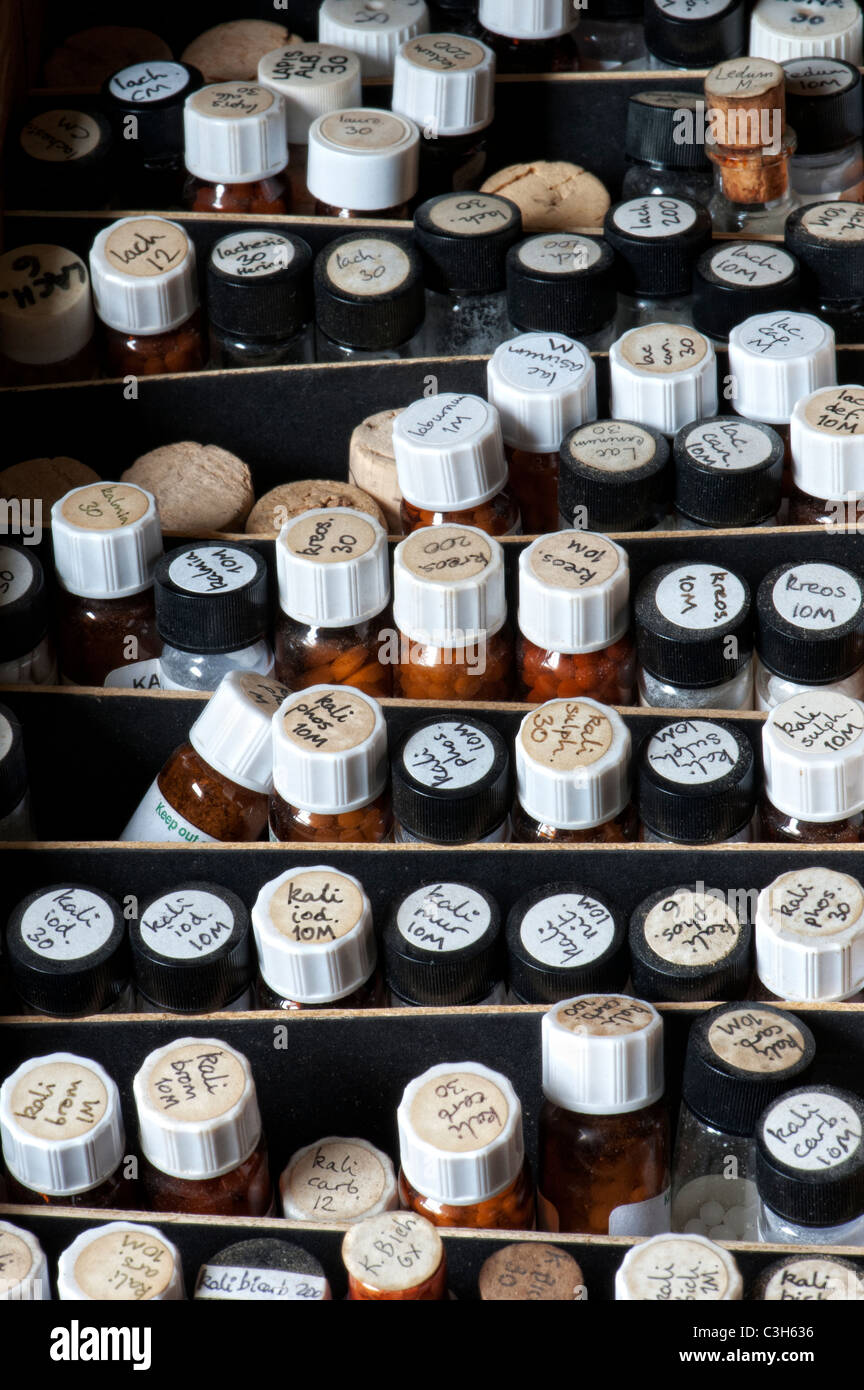 Bottles of Homeopathic remedy pills in a wooden draw Stock Photo - Alamy