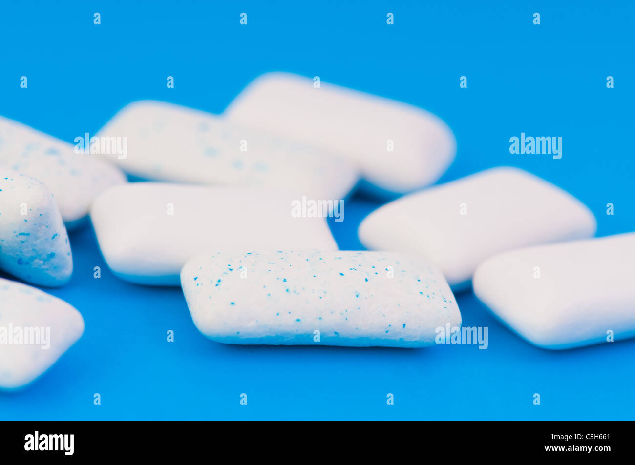 Chewing gums on blue Stock Photo - Alamy