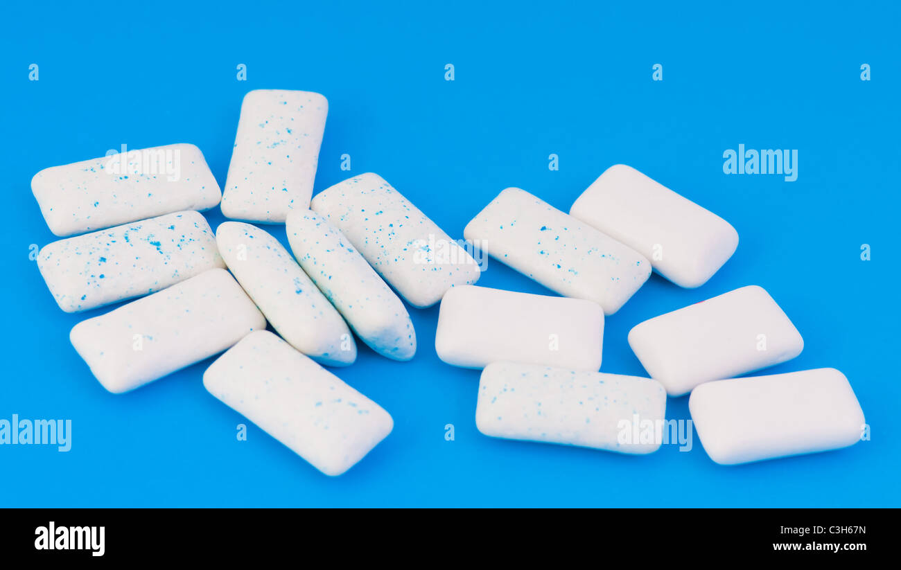Chewing gums on blue Stock Photo - Alamy
