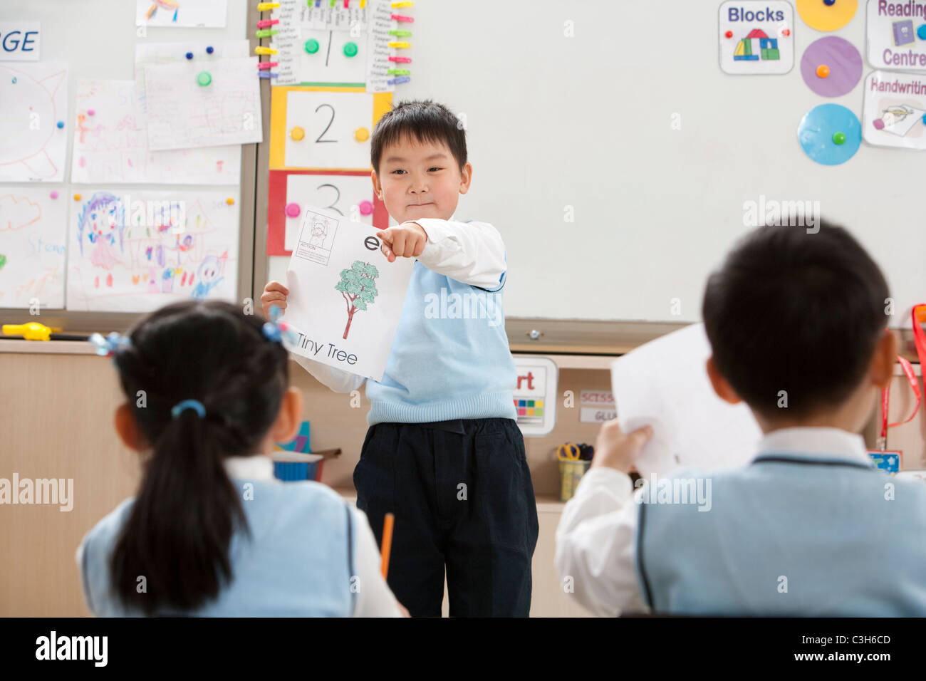 Student calling on fellow students during a presentation Stock Photo ...