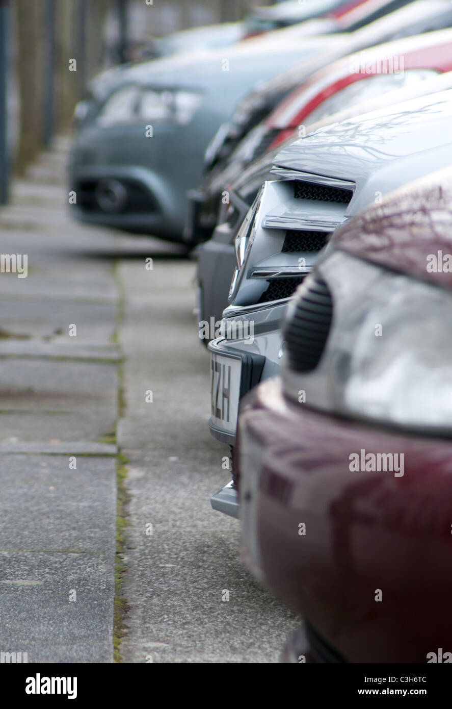 Cars Lined Up and Parked Stock Photo - Alamy