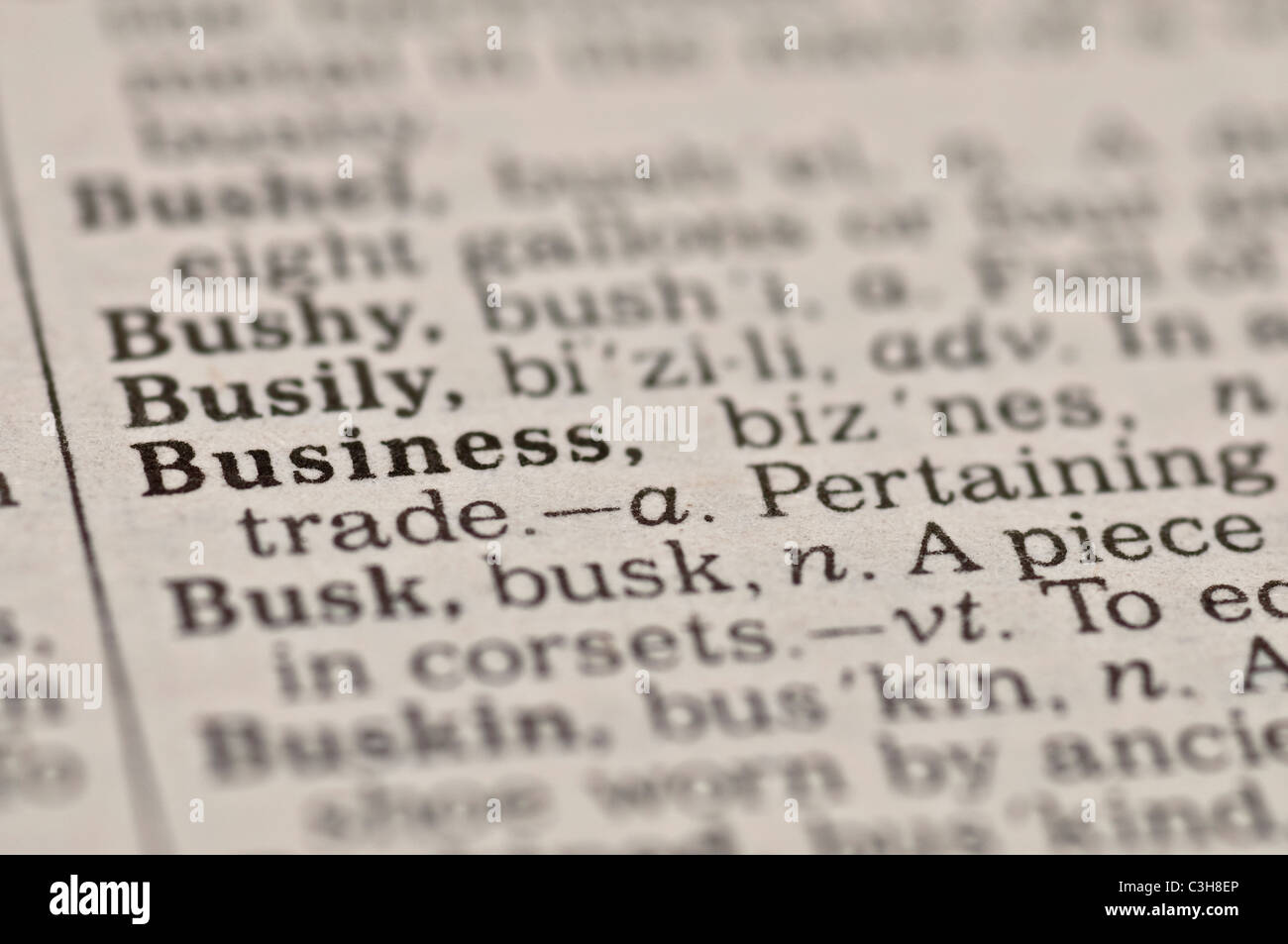 Extreme close up of the word BUSINESS found inside a dictionary Stock ...