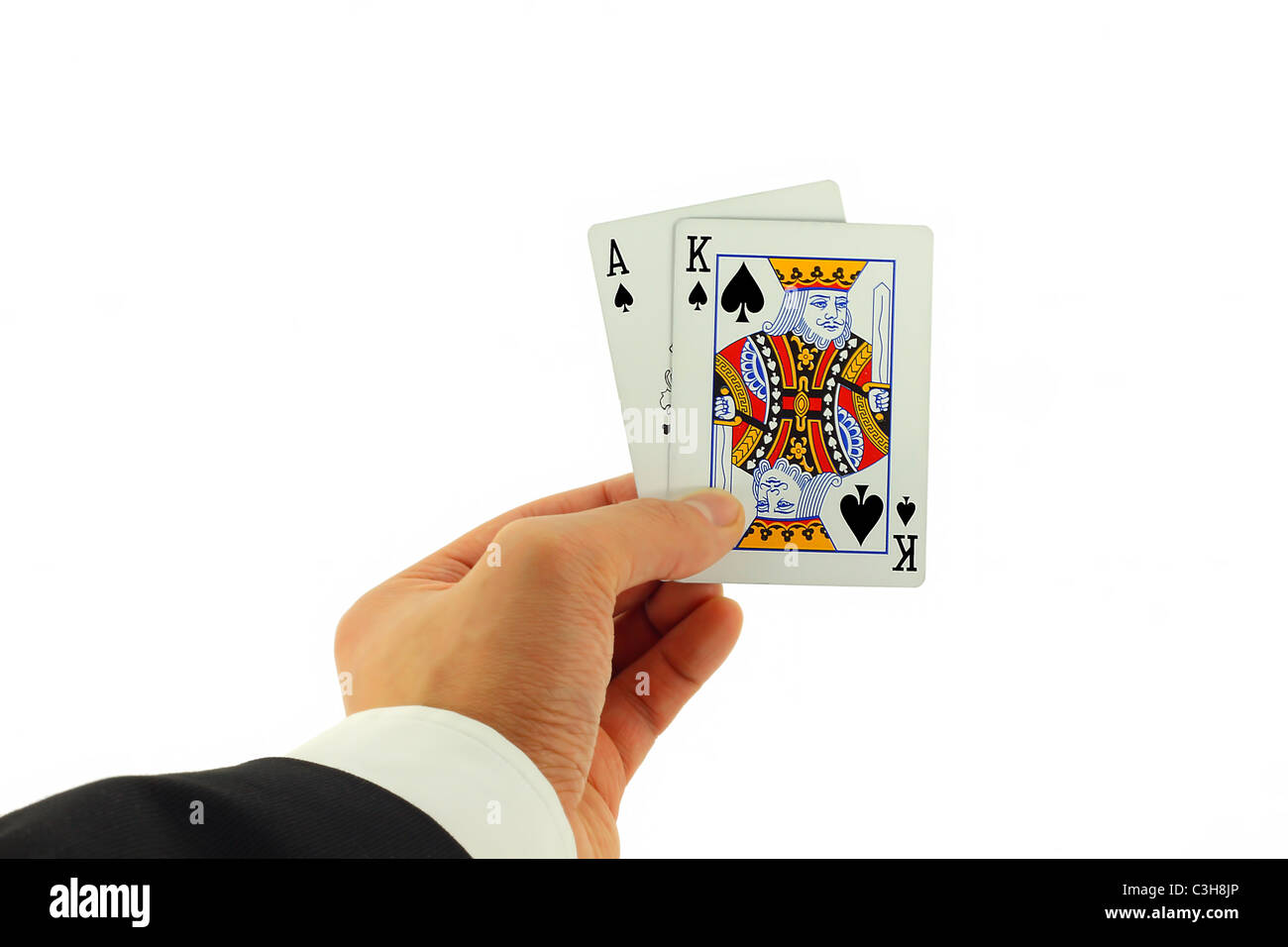 Close up of Blackjack winning cards in the hand of a suited man Stock ...