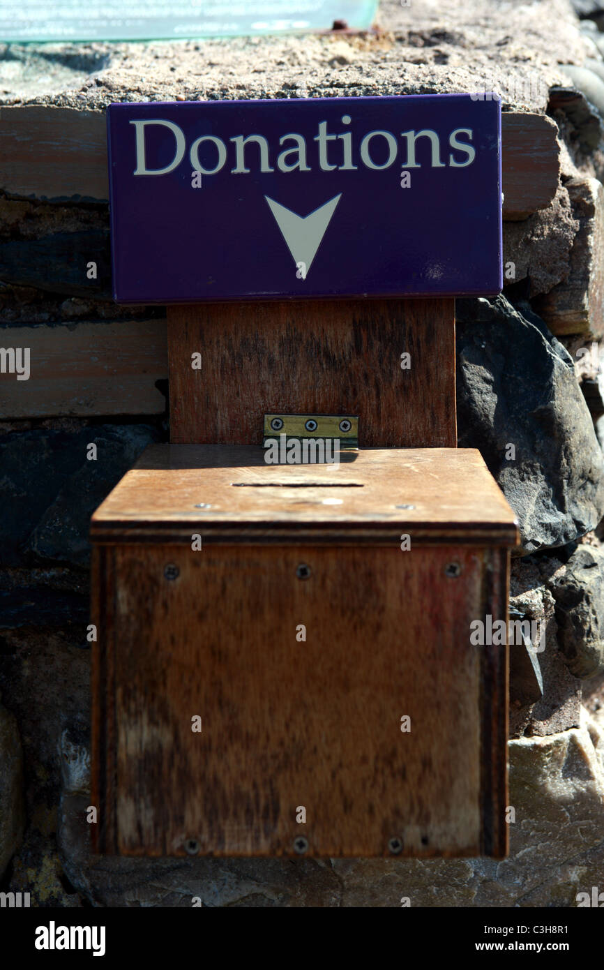 Donations sign and box Stock Photo - Alamy