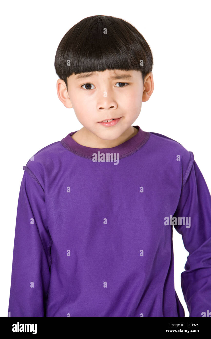 Young boy expressing anxiety and confusion Stock Photo - Alamy