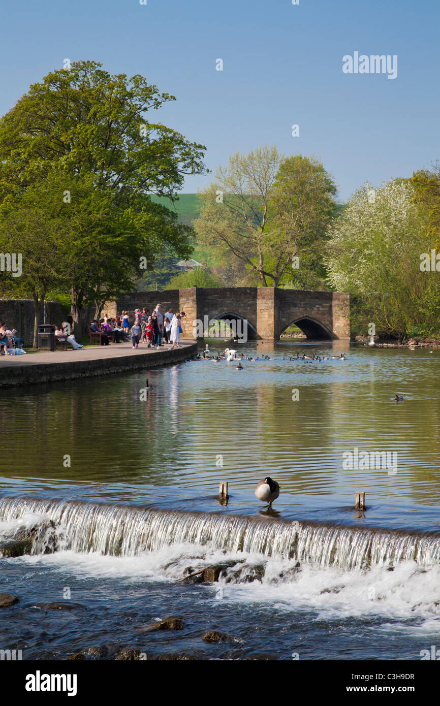 small weir on the River Wye flowing through Bakewell Derbyshire Peak ...