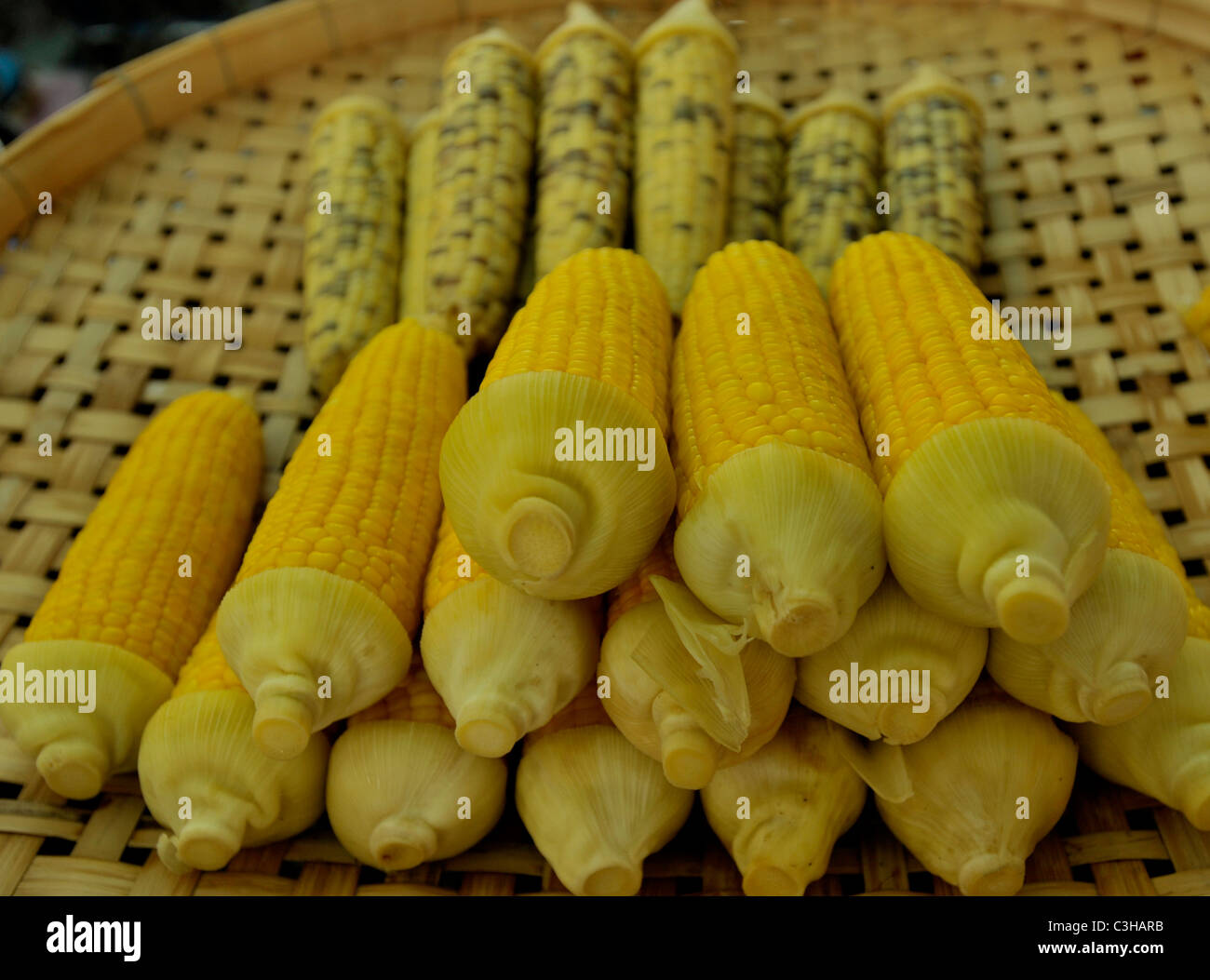 corn on the cob steamed thai style , thai delicacy, street market ...