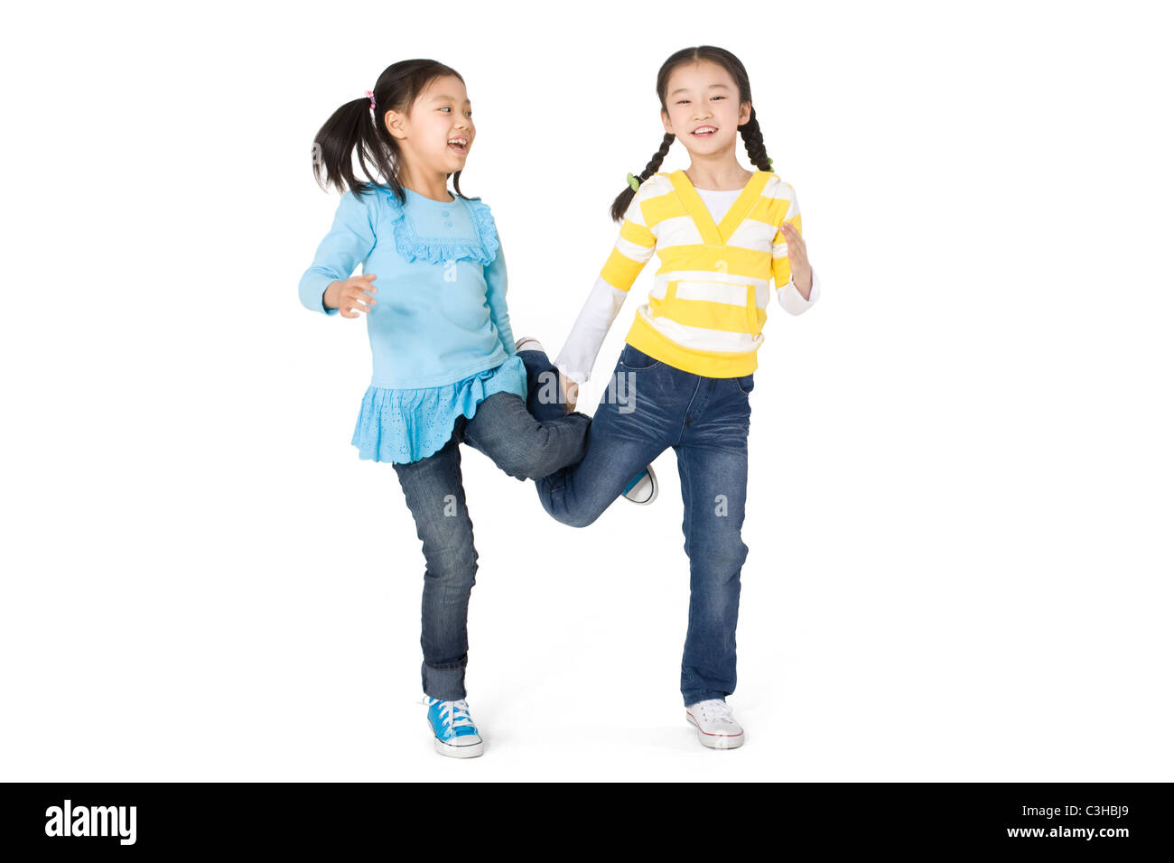Two cheerful girls one braids hi-res stock photography and images - Alamy
