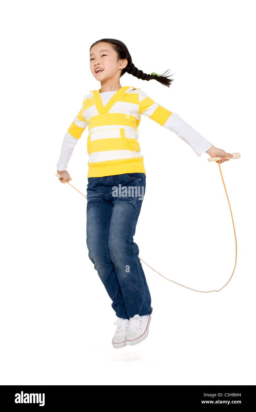 Young girl jumping rope Stock Photo - Alamy
