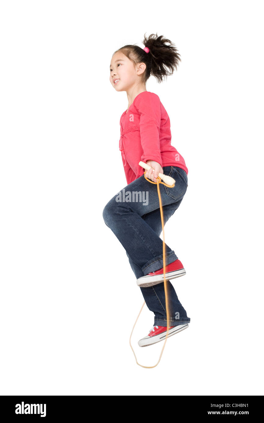 Young girl jumping rope Stock Photo - Alamy
