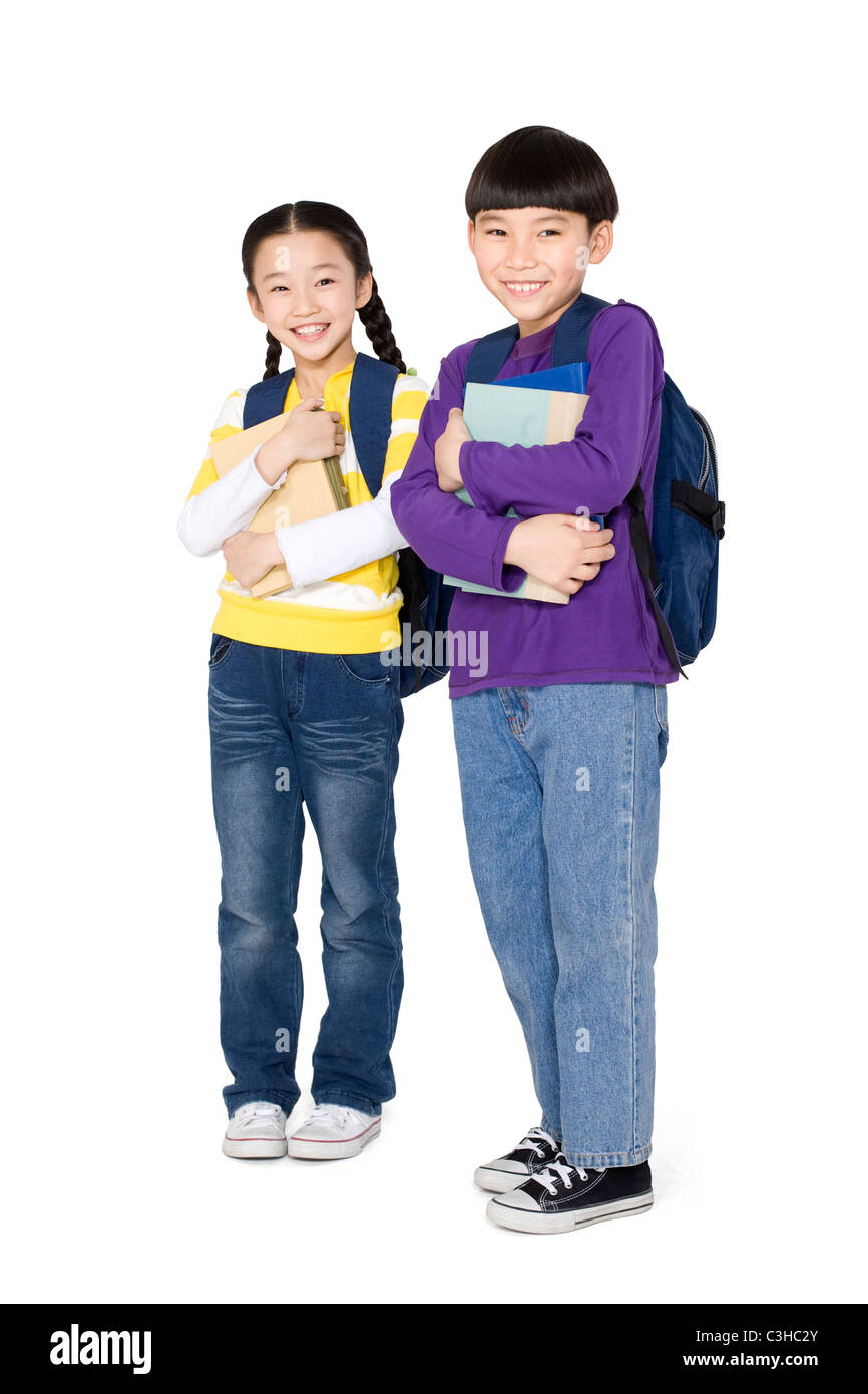 Two boys studying with books Cut Out Stock Images & Pictures - Alamy