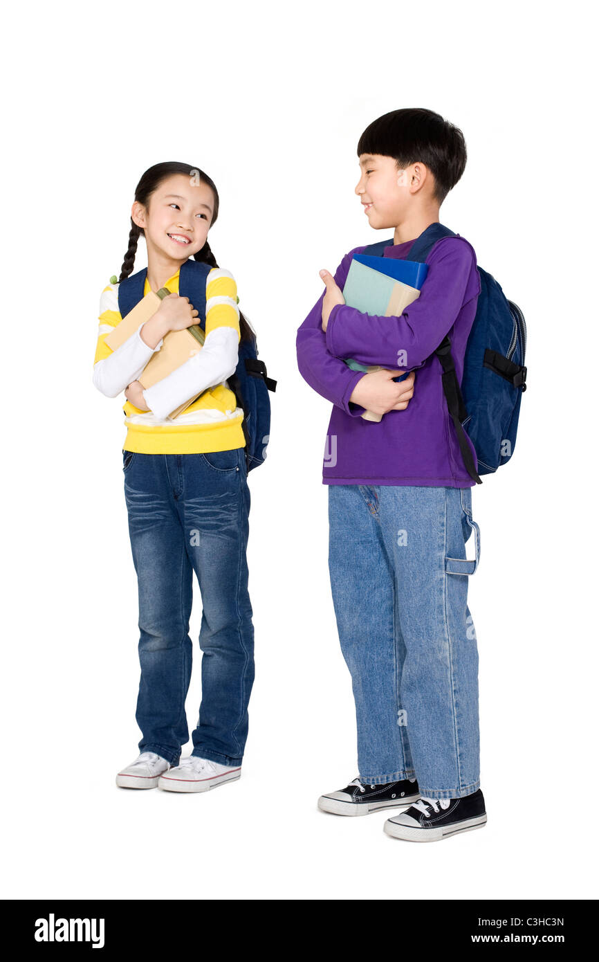 Two boys studying with books Cut Out Stock Images & Pictures - Alamy