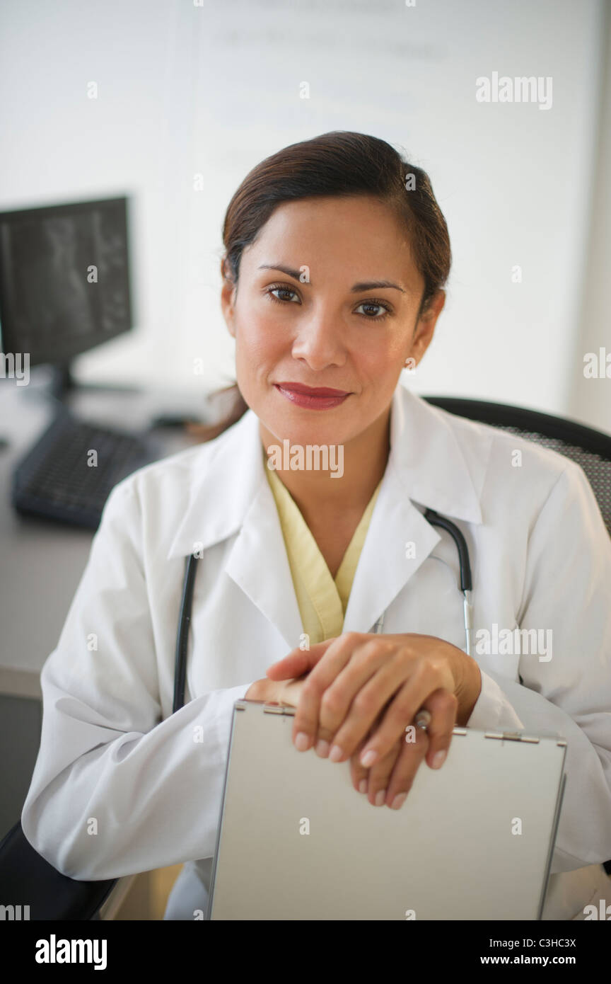 Portrait of smiling female doctor Stock Photo - Alamy