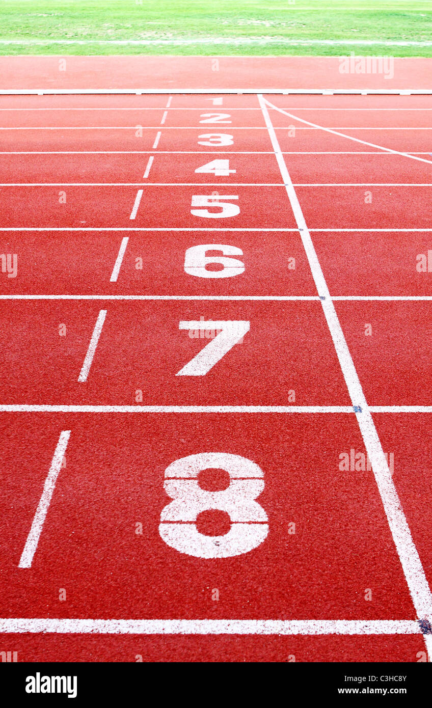 Starting lane of running track Stock Photo - Alamy