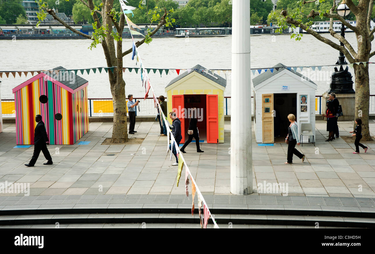 Coloured beach huts on London's Southbank Stock Photo - Alamy