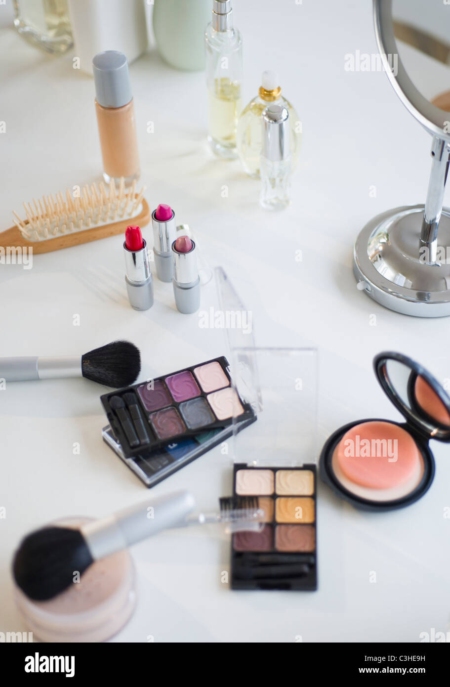 Make-up cosmetics on table Stock Photo - Alamy