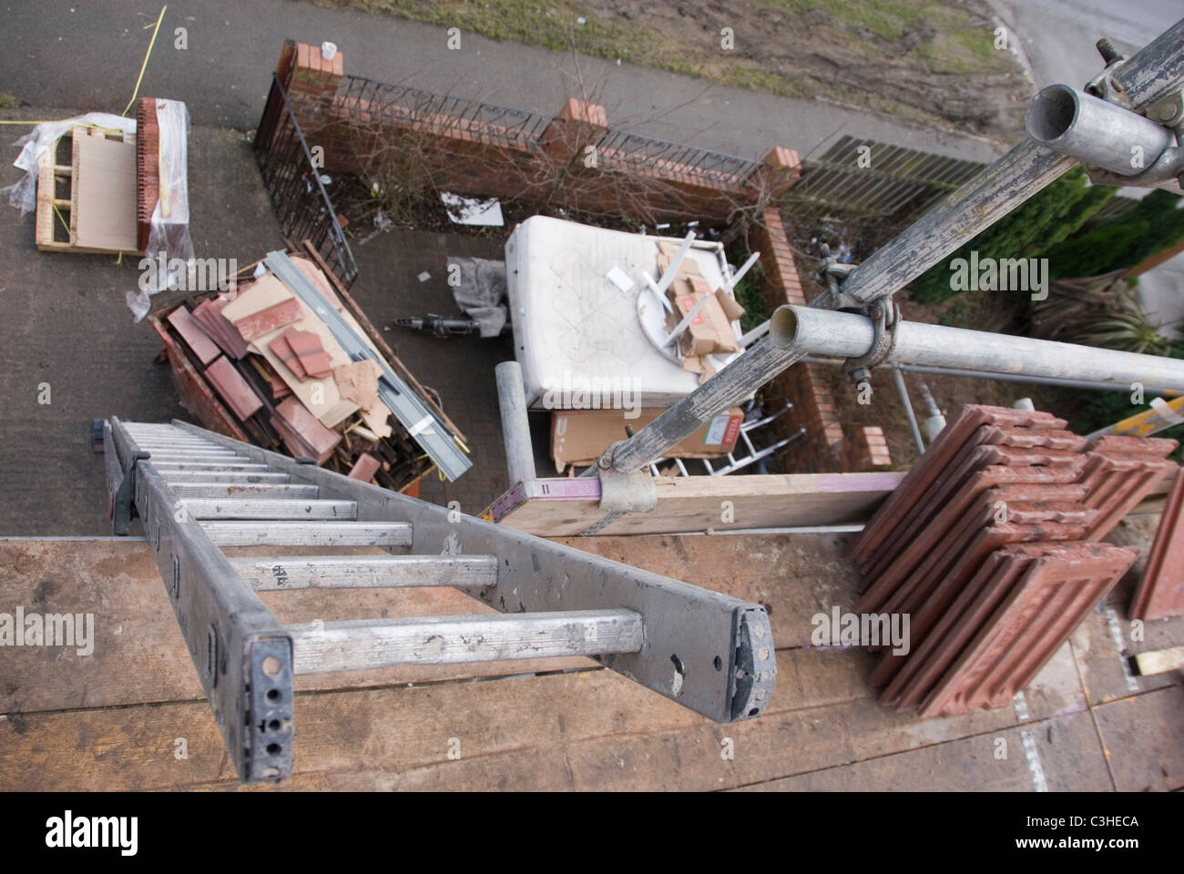 Top of Ladder & Full Skip in Garden Below, View from Scaffolding, Re ...