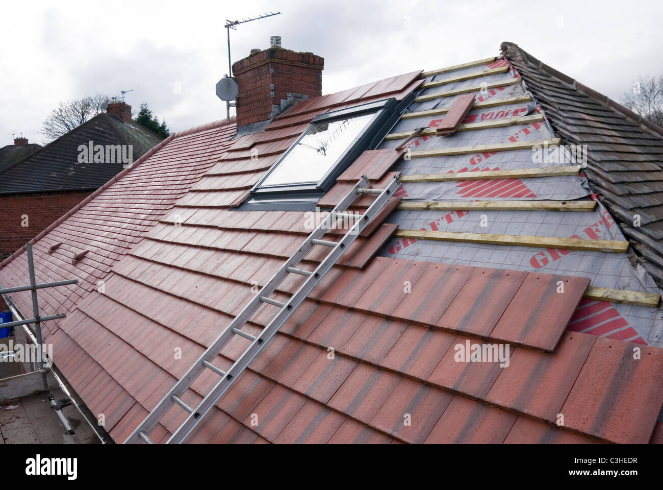Close up Wooden Strutts and New Velux Window, Re Roofing Residential ...