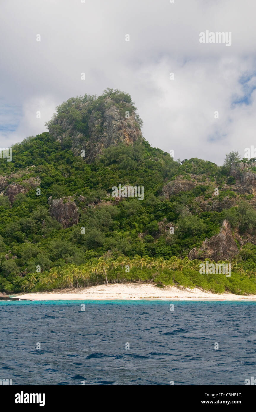 One of the pretty shorelines in the numerous islands of Fiji is along ...
