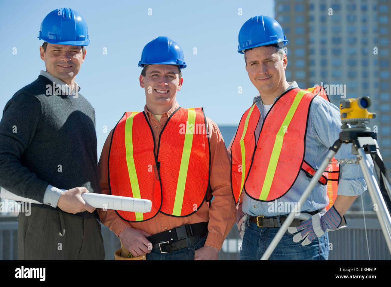 Portrait of three construction workers Stock Photo - Alamy
