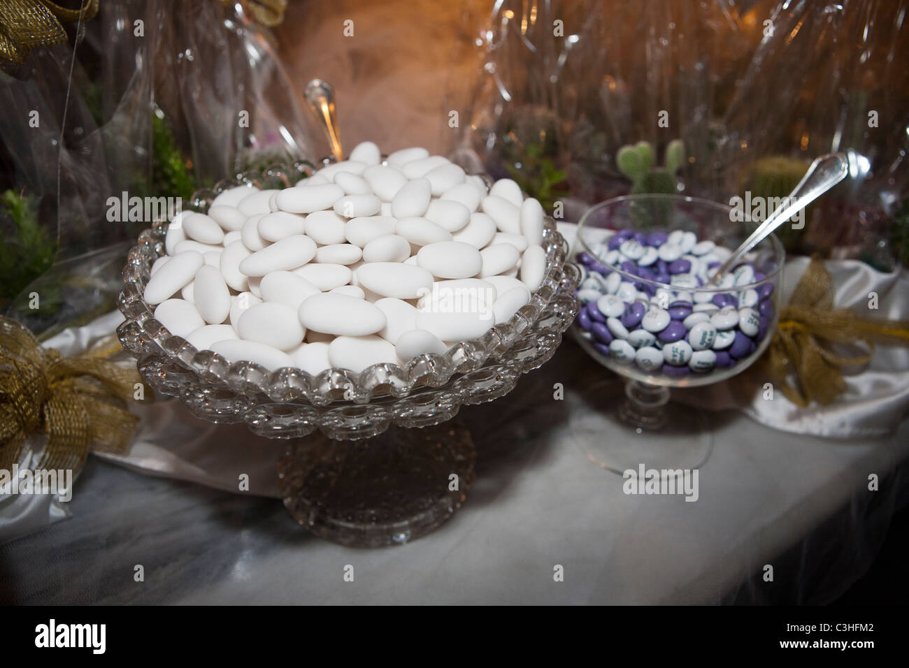 Bowl of sweets and confetti Stock Photo - Alamy