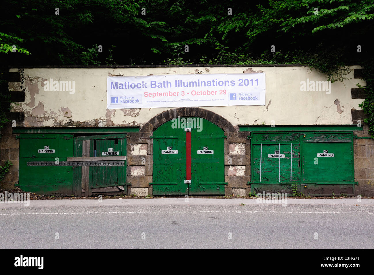 garages with no parking signs matlock england uk Stock Photo - Alamy