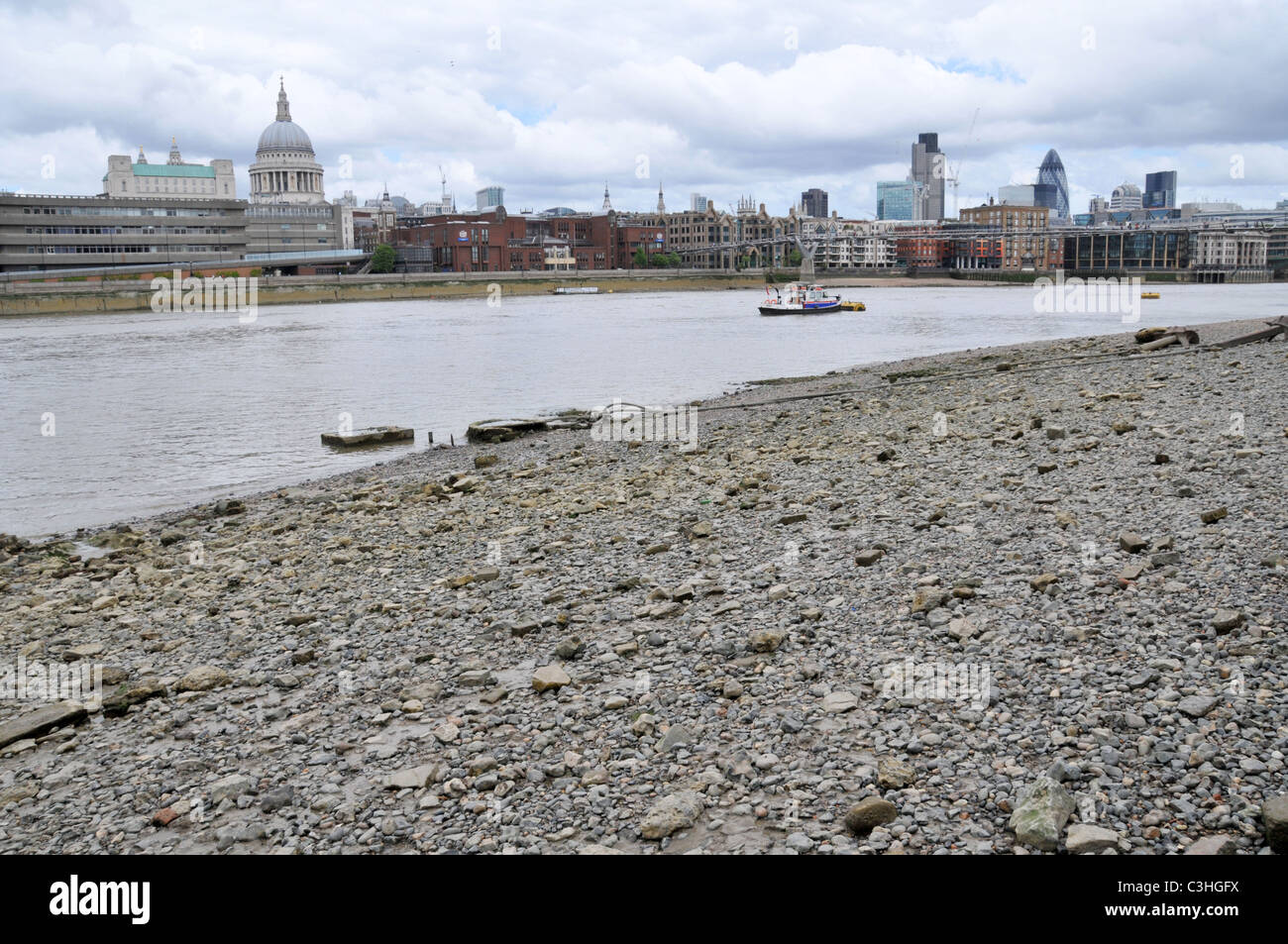 River Thames low tide Thames foreshore beach pebbles sand Stock Photo ...