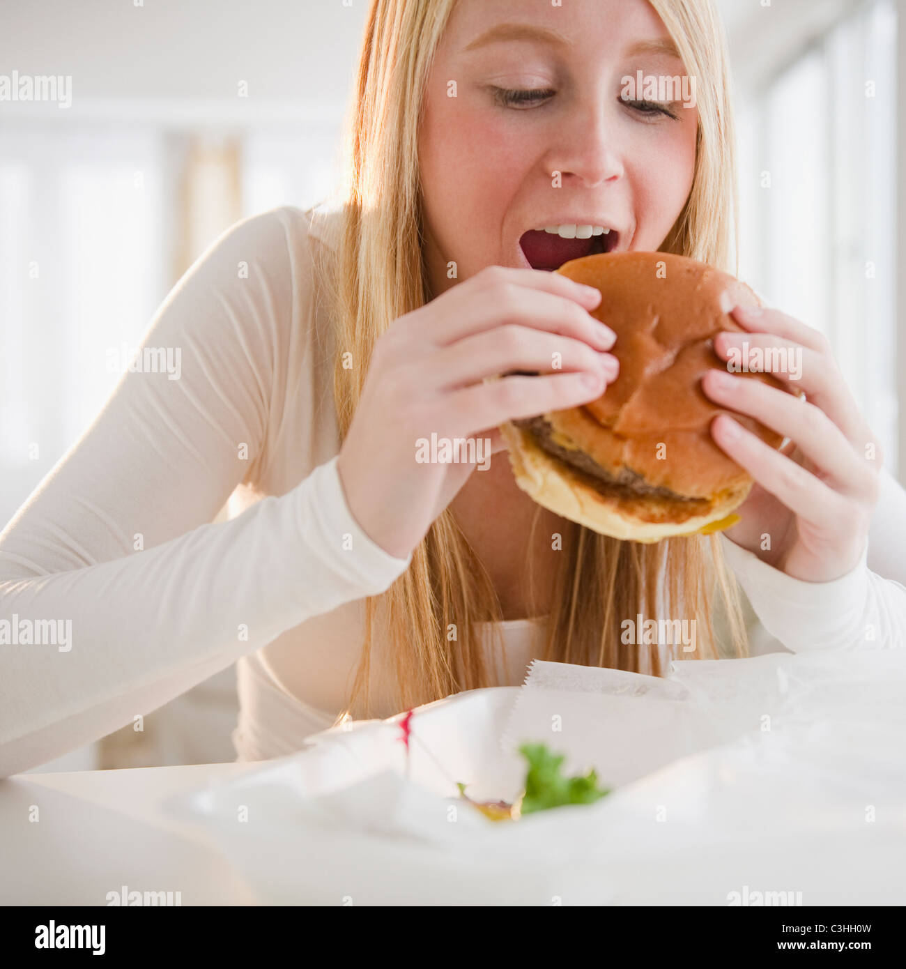 Very hungry woman hi-res stock photography and images - Alamy