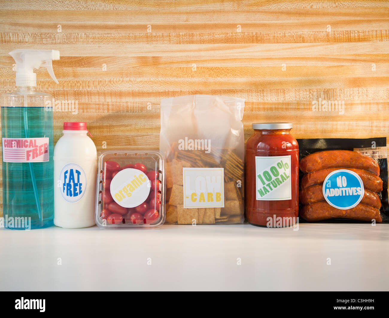 Organic products in row at shelf Stock Photo - Alamy