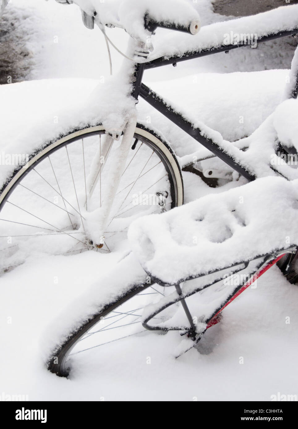 Bicycles in snow Stock Photo - Alamy