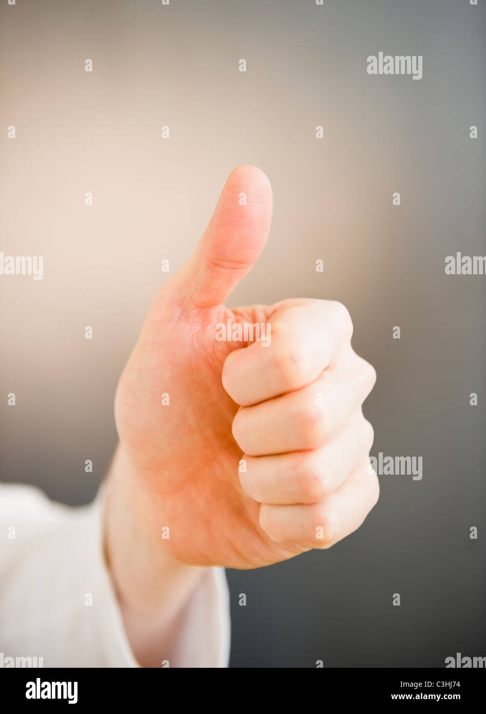 Thumbs up hand close up hi-res stock photography and images - Alamy