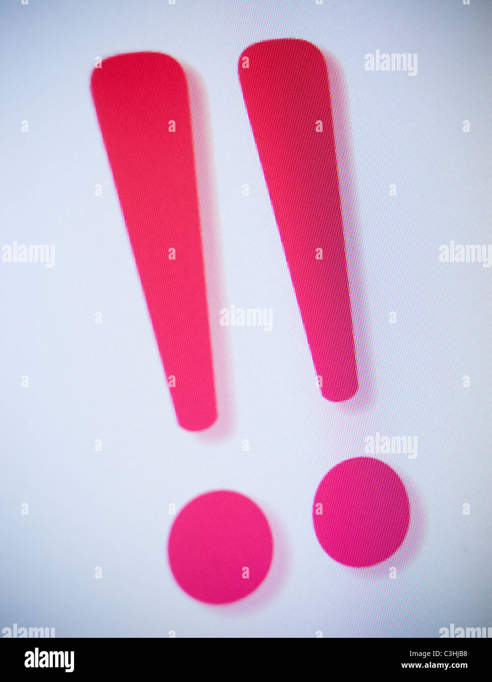 Studio shot of exclamation marks Stock Photo - Alamy