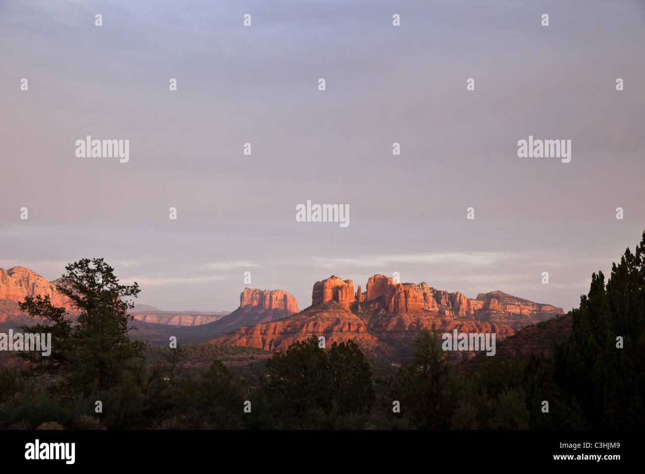 Sunset falls on Cathedral Rock, one of the most famous red rock ...