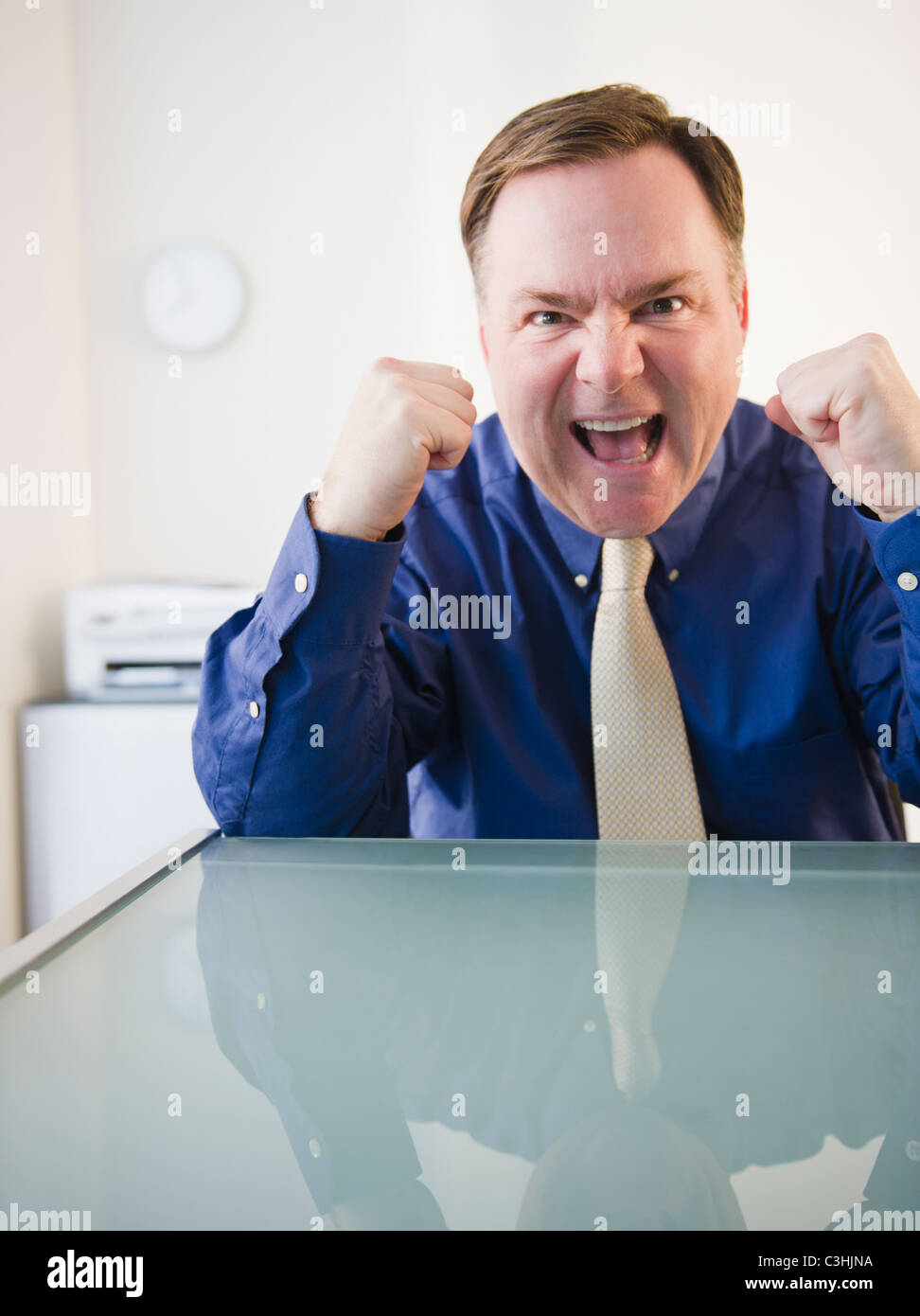 Head and shoulders clenched fist hi-res stock photography and images ...