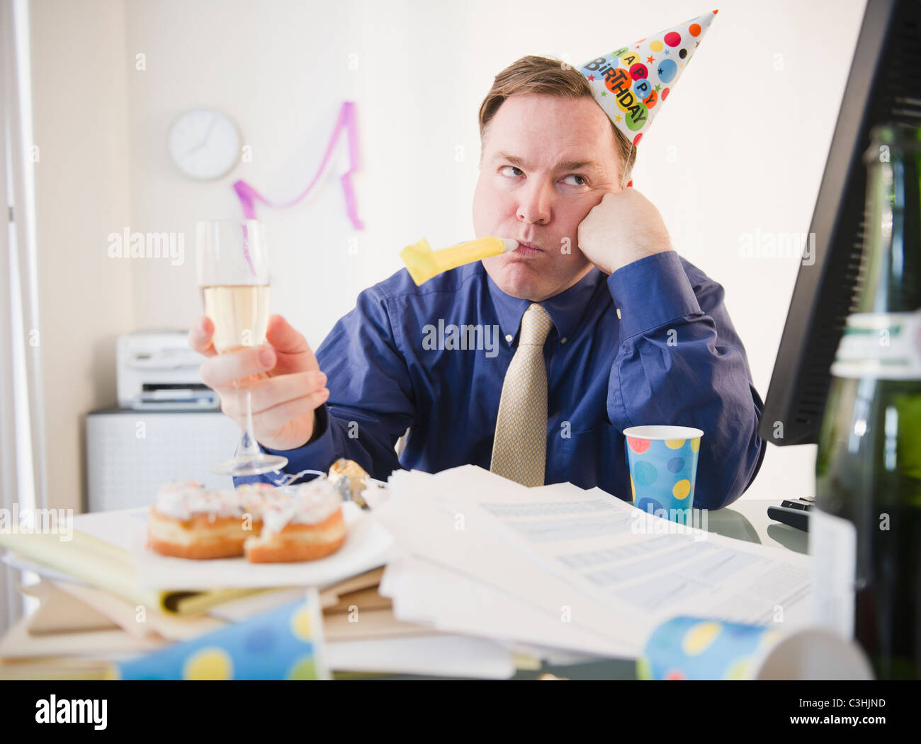 Businessman at office party Stock Photo - Alamy